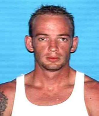 Suspect in hit-run that killed Harris couple surrenders