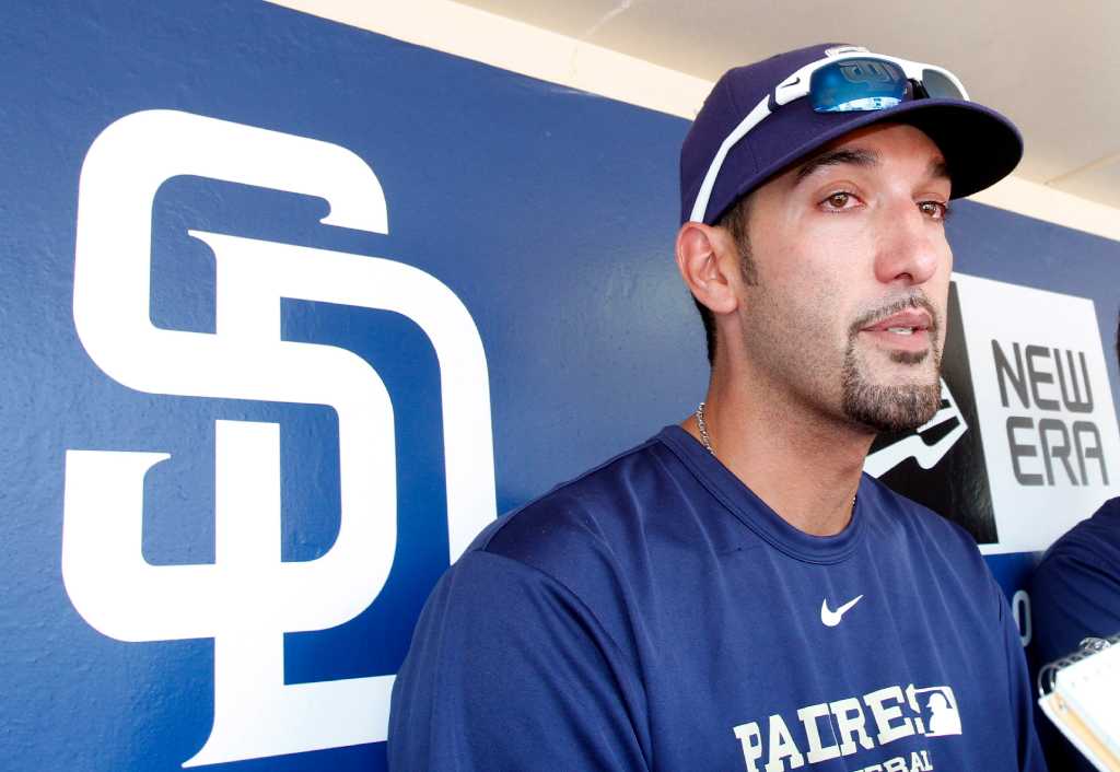 Rangers get reliever Adams from SD for 2 players