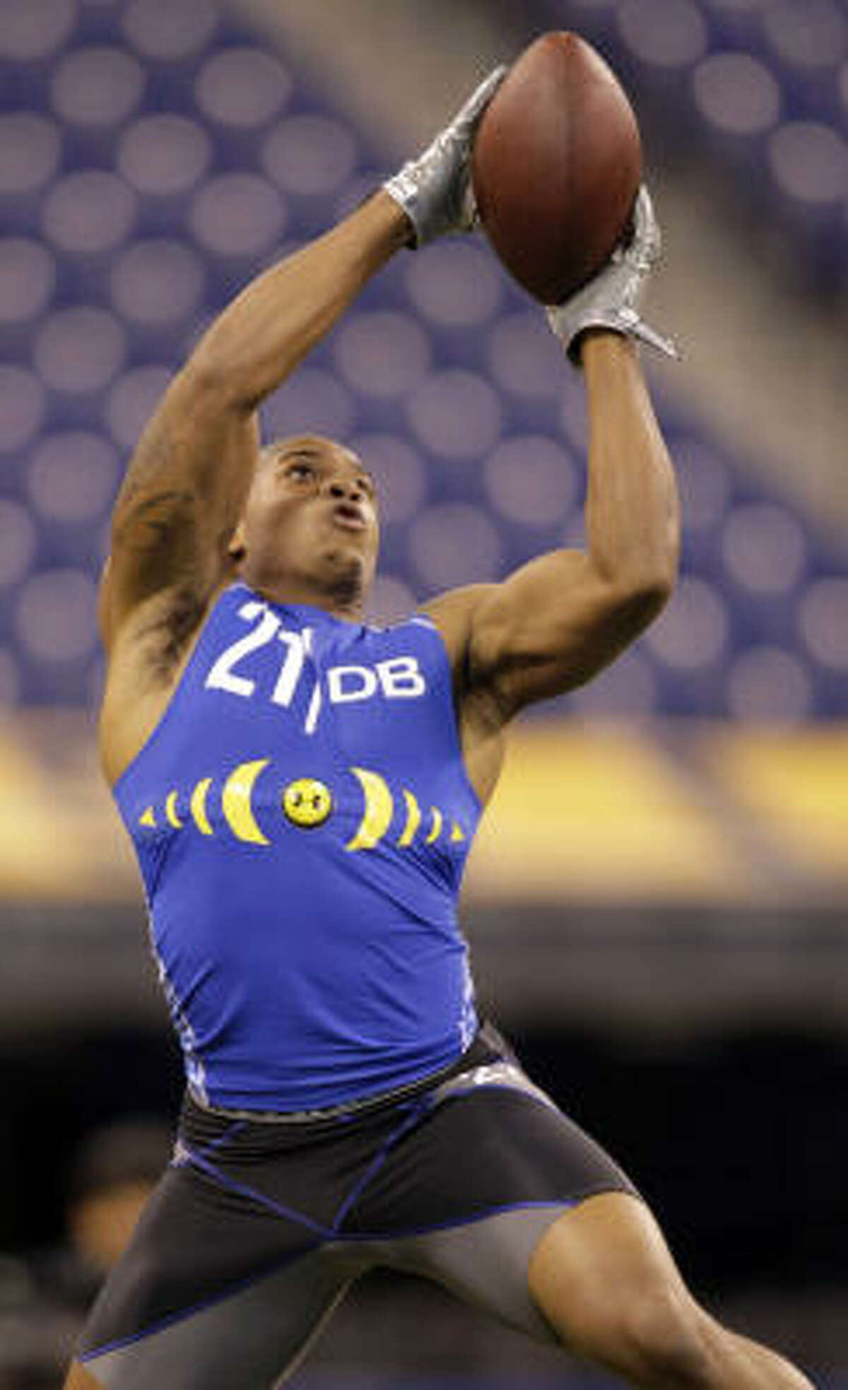 Texans pick linebacker, trade up for CB in second round