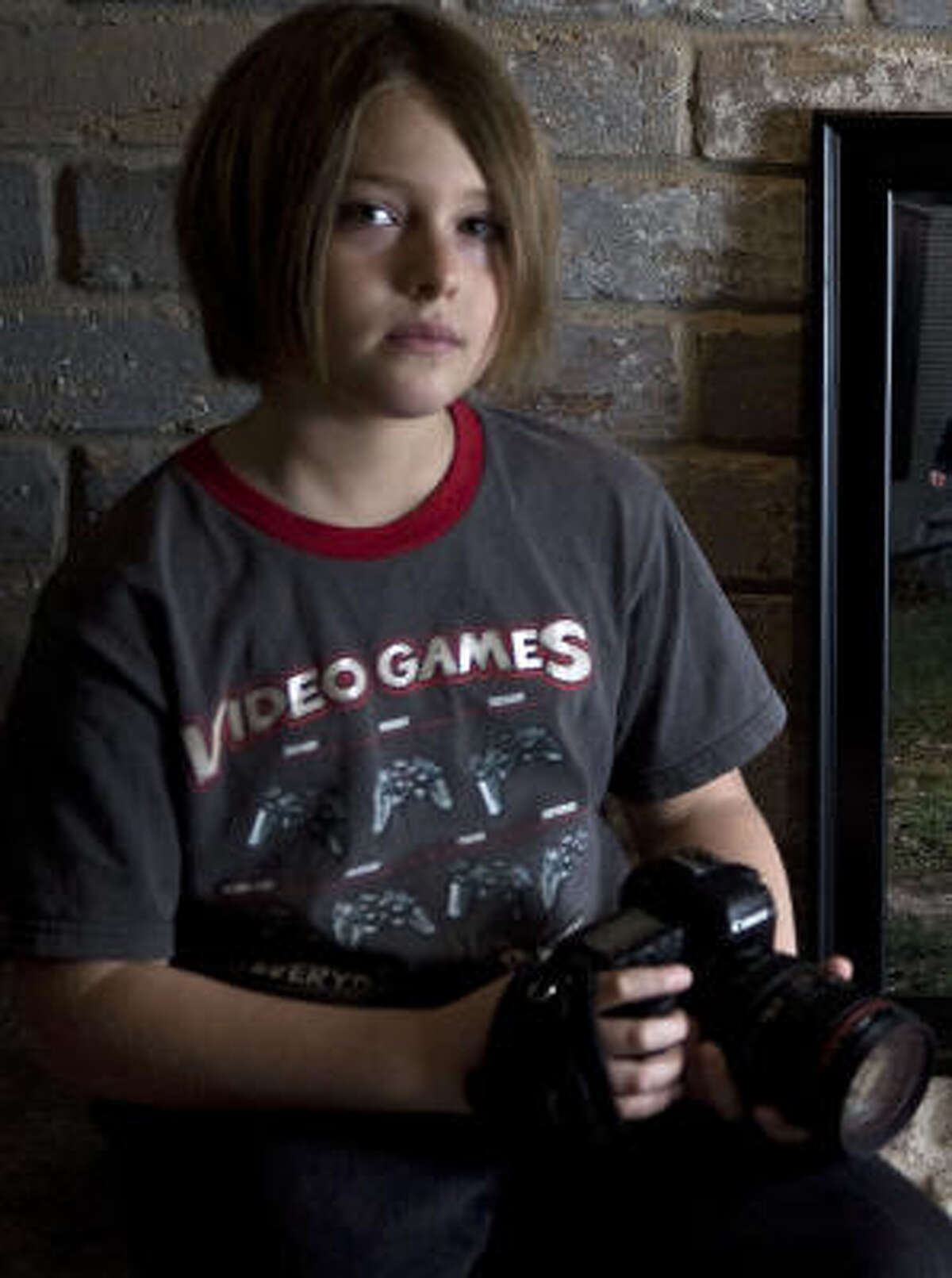 Young photography whiz’s art worries church