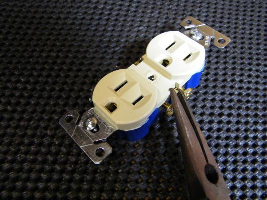 Electrical outlet tab secret to appliances operating independently