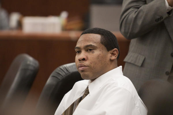 Brother of suspect in officer's killing says wrong man arrested