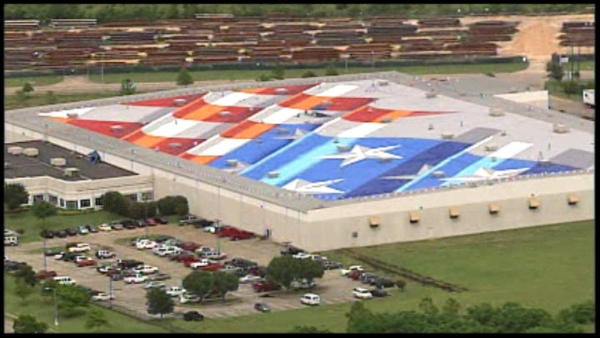 Giant flag painting on roof a labor of love for artist