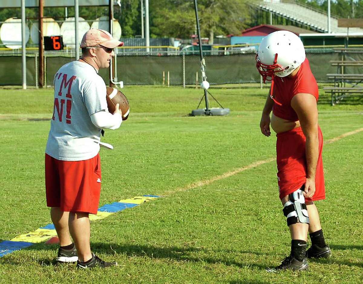 Lumberton's Dylan Mouton is playing through the pain this football season
