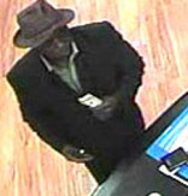 Police seek dapper north Harris County robber