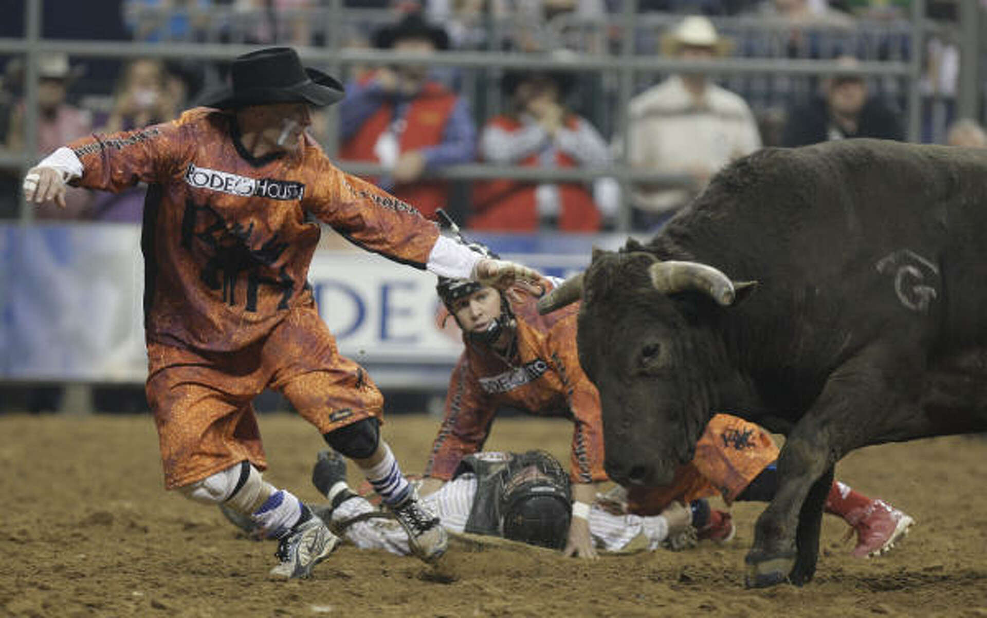 Rodeo clowns forgo face paint, goofy garb in serious task