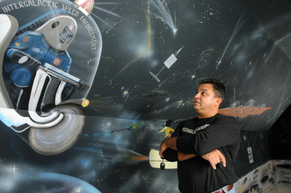 Humble artist excels at murals