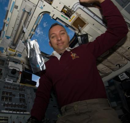 Houston astronaut over the moon as daughter is born