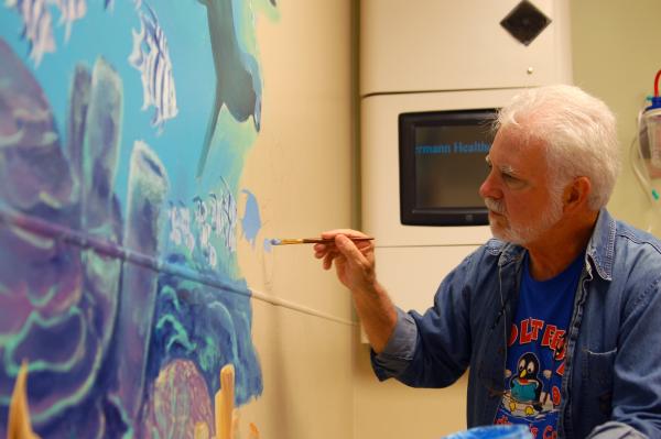 Muralist creates underwater wonderland at hospital