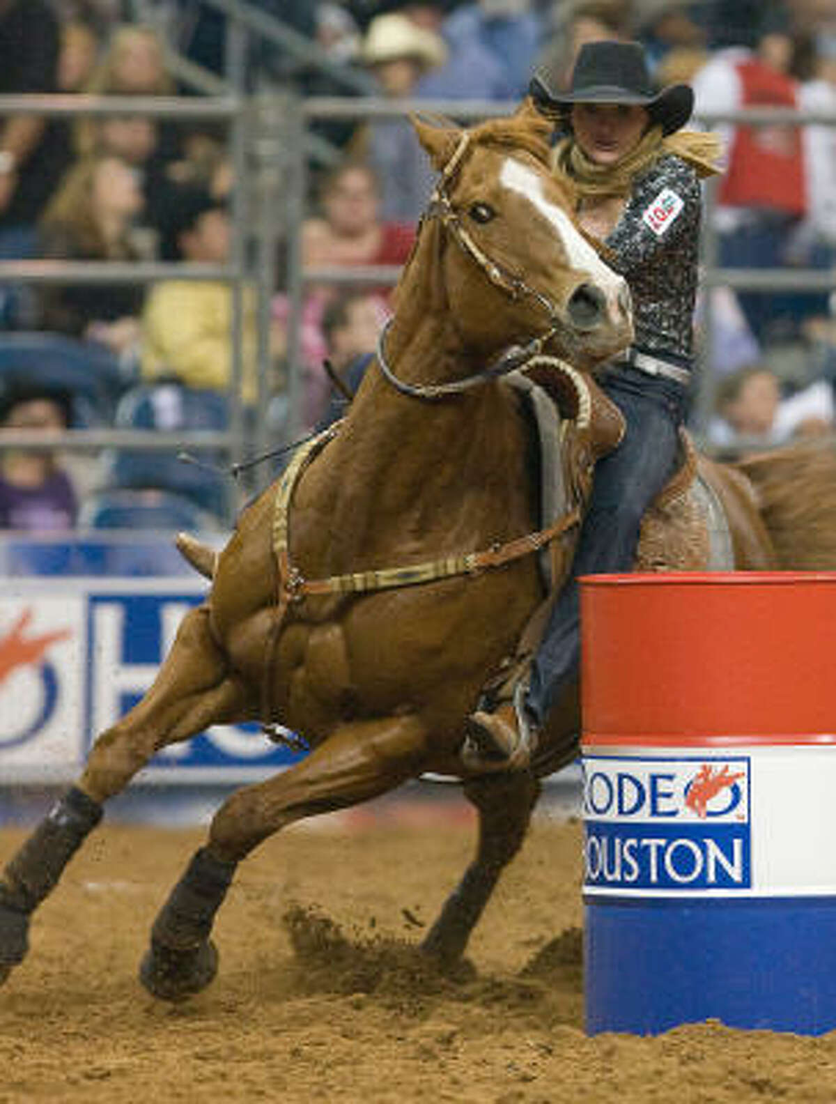 Canadian defends rodeo racing title with four-legged pal