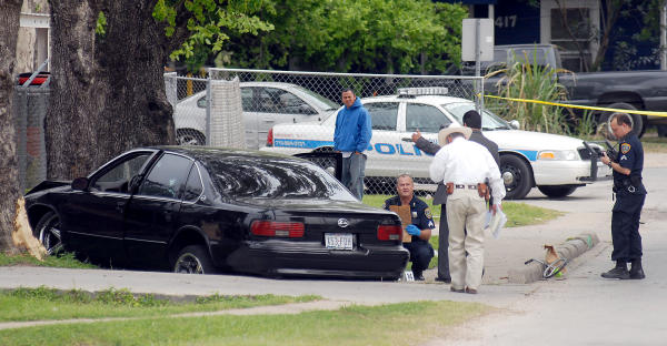 Man in bulletproof vest shot to death inside car