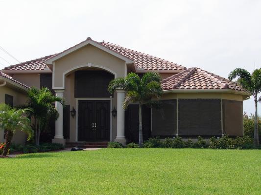 Hurricane-wind abatement system works like bullet-proof vest for home