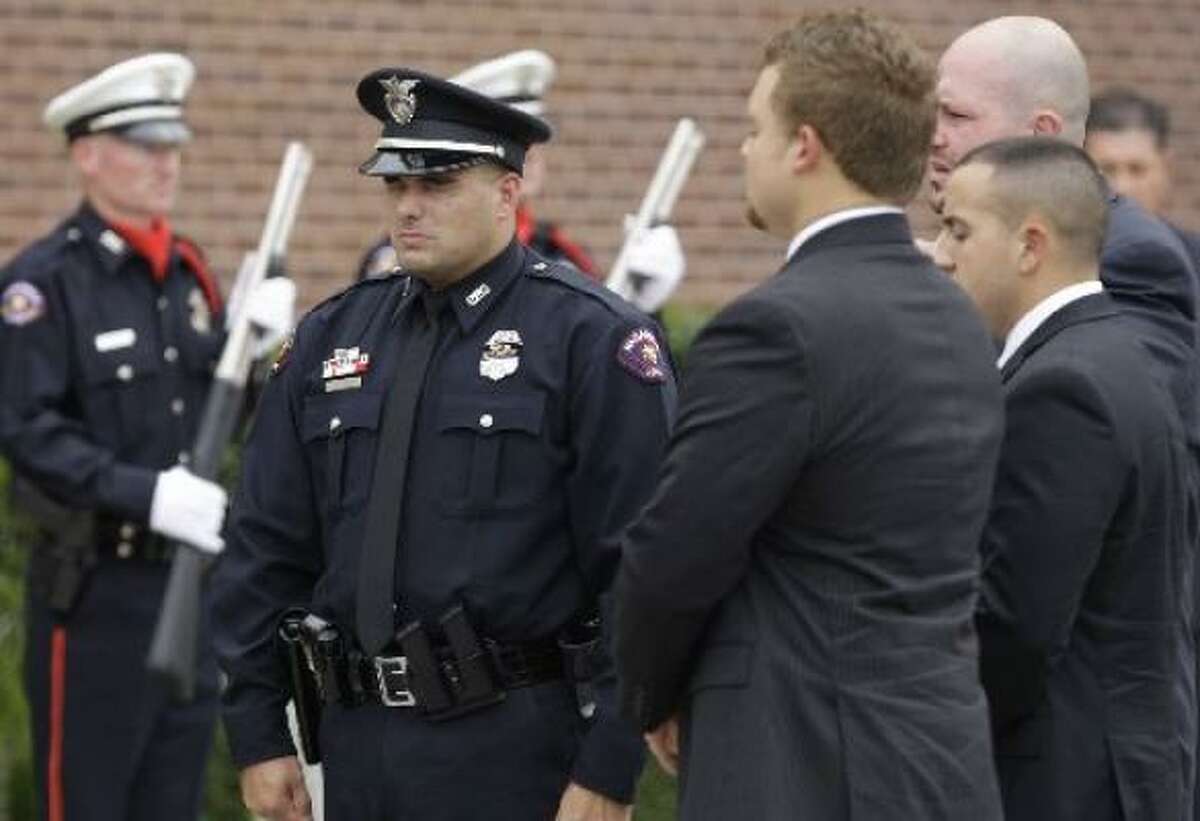 Officers say farewell to slain Pasadena patrolman