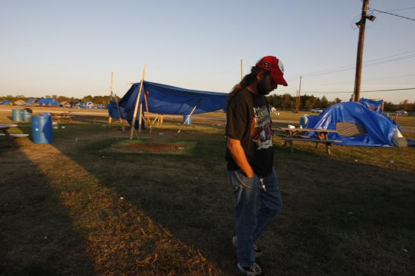 Blue-tarp laborers still waiting to be paid after Ike
