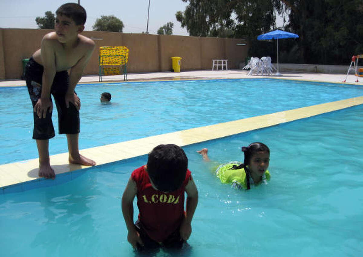 Iraqi boy's first swim hopeful sign of progress