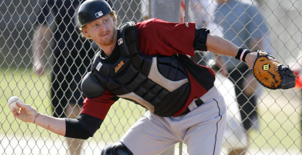 Astros catcher Towles strains hamstring