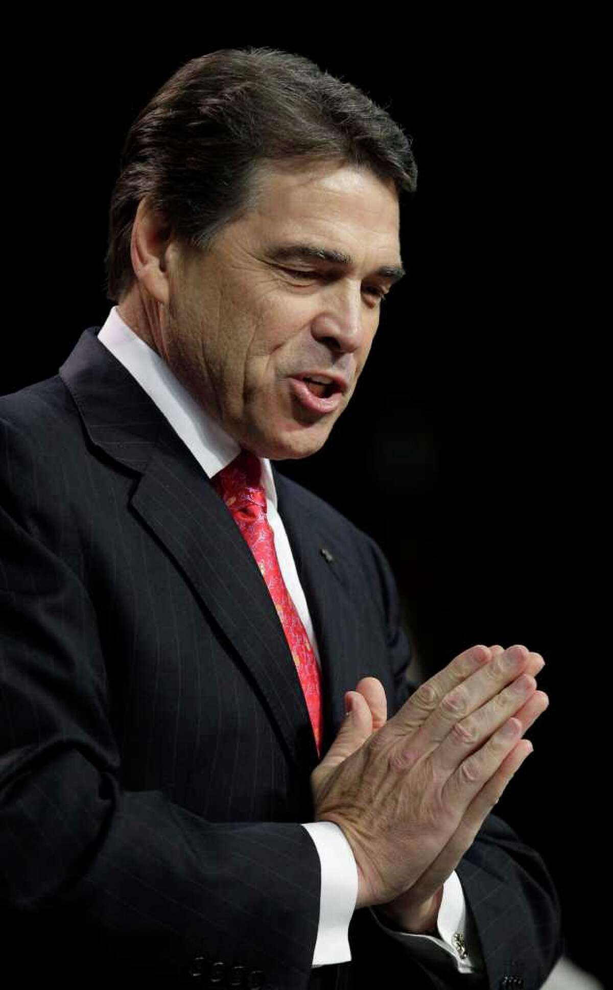 30,000 heed Perry's call for prayer