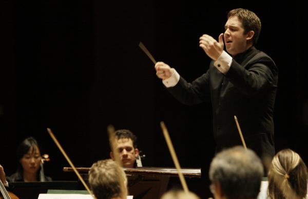Conductor Brett Mitchell learns from the feedback