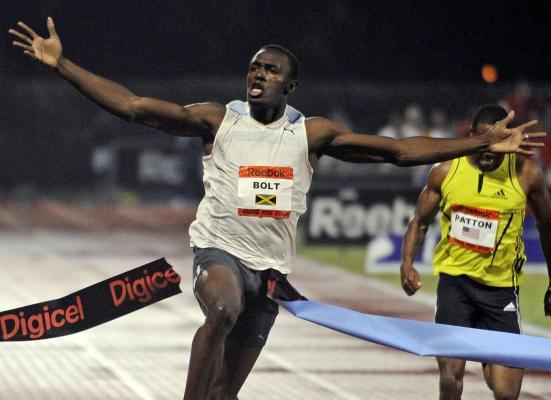 Jamaican sprinter Bolt sets world record in 100 meters