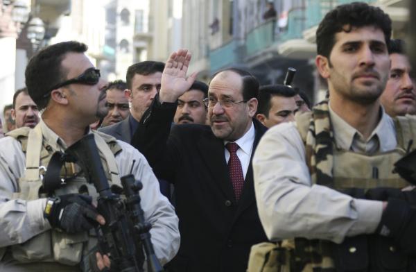 Hangout for Iraqi intellectuals reopens after bombing