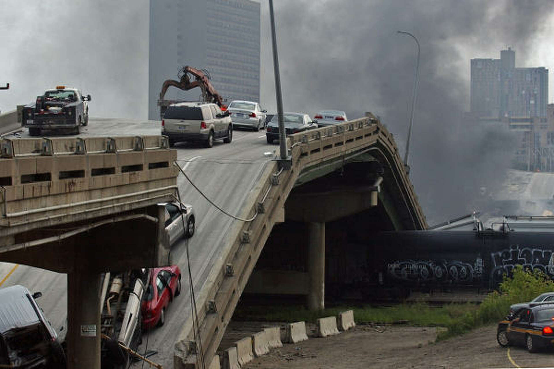 Police say more victims still in cars after bridge collapse