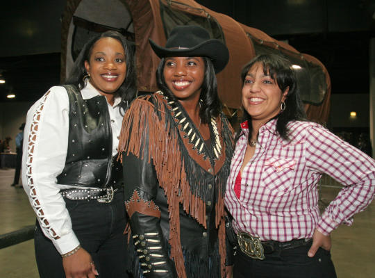 Rodeo partyers kick up their heels