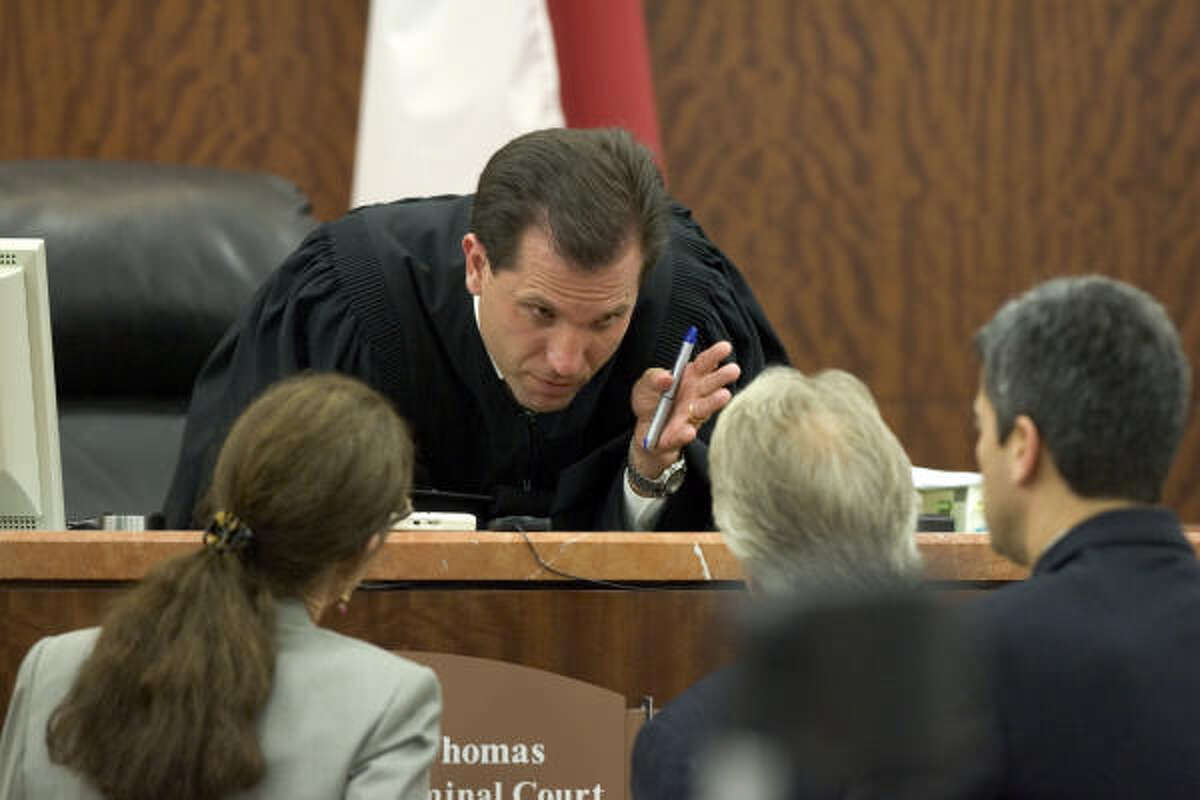 Slade's dining set cost $40,000, ex-aide testifies