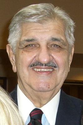 Houssein, poet, retired businessman