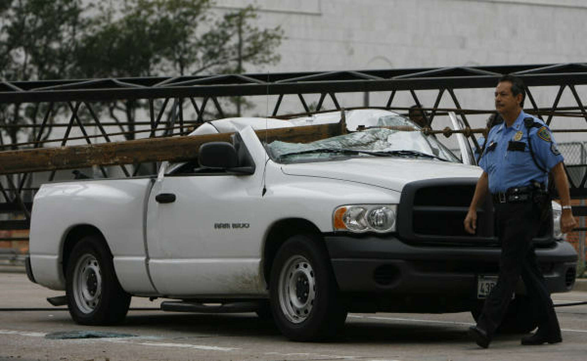 Crane crushes truck; driver suffers scratch, bump