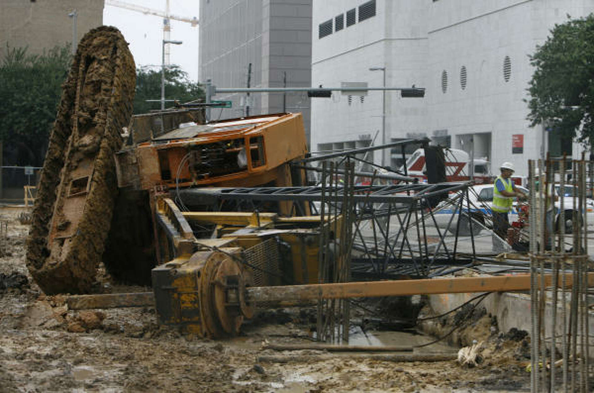 Crane crushes truck; driver suffers scratch, bump