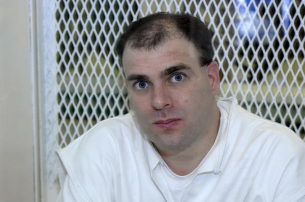 Death row inmate denies rape, killing of Willis woman