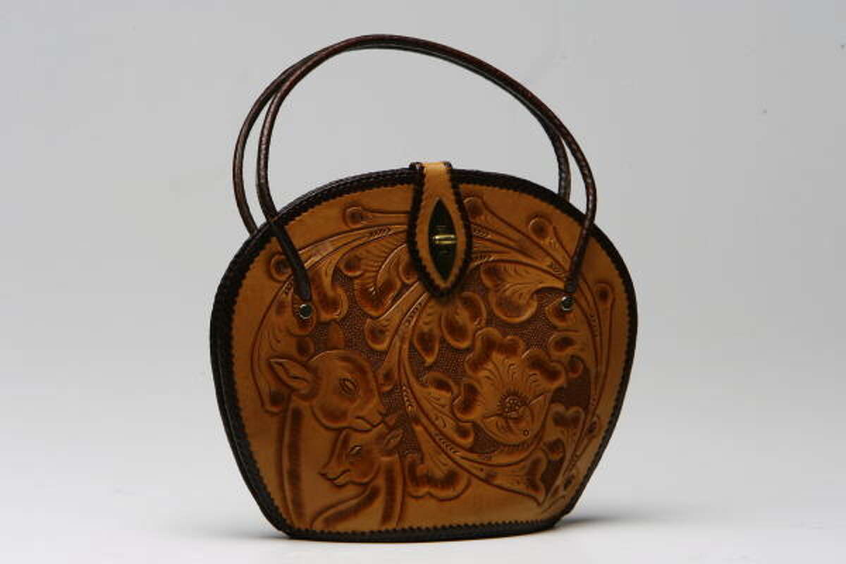 Celebrity-owned purses featured in silent auction