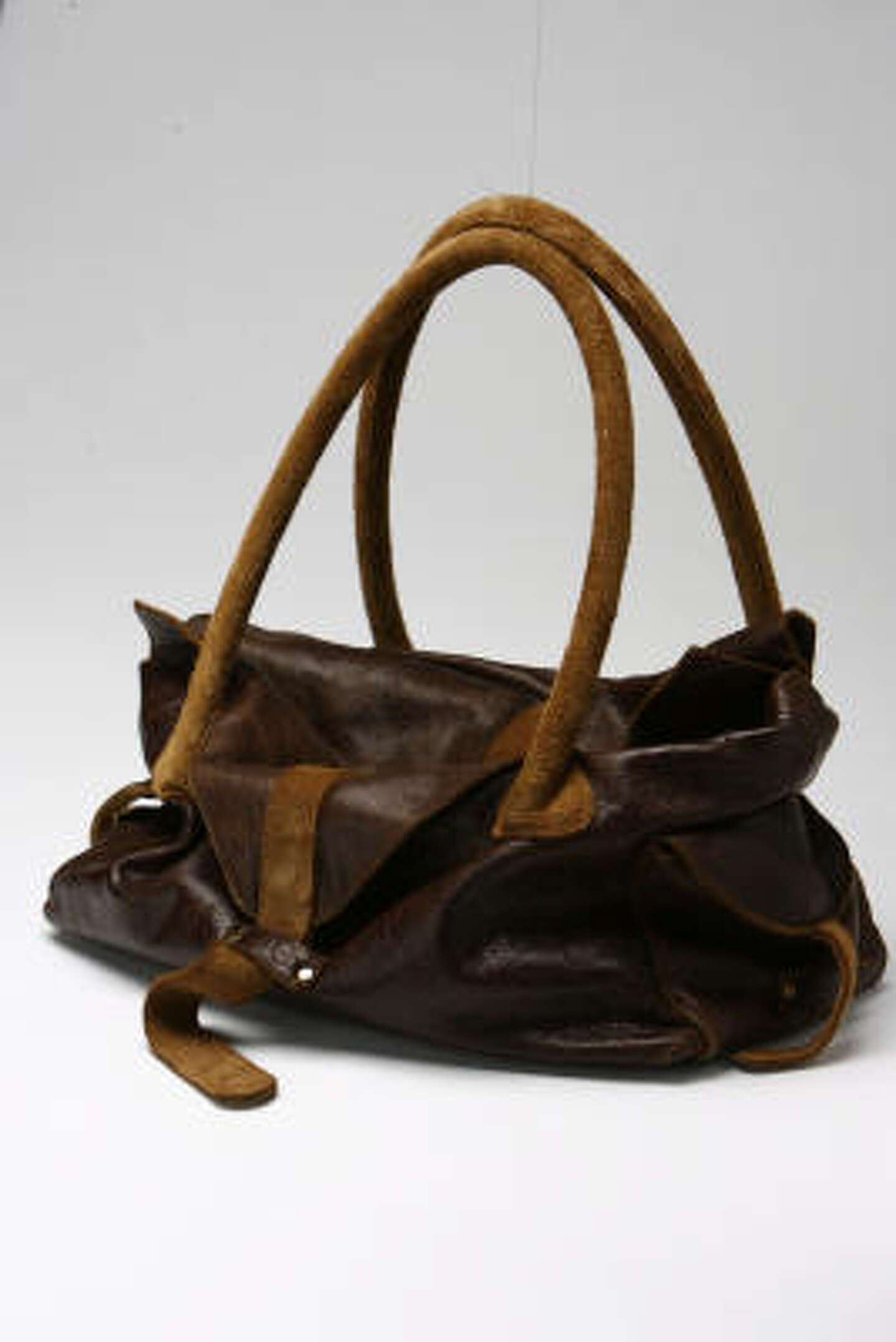 Celebrity-owned purses featured in silent auction