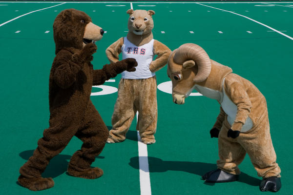 SHOWING SPIRIT: Alief high school mascots fire up the crowd