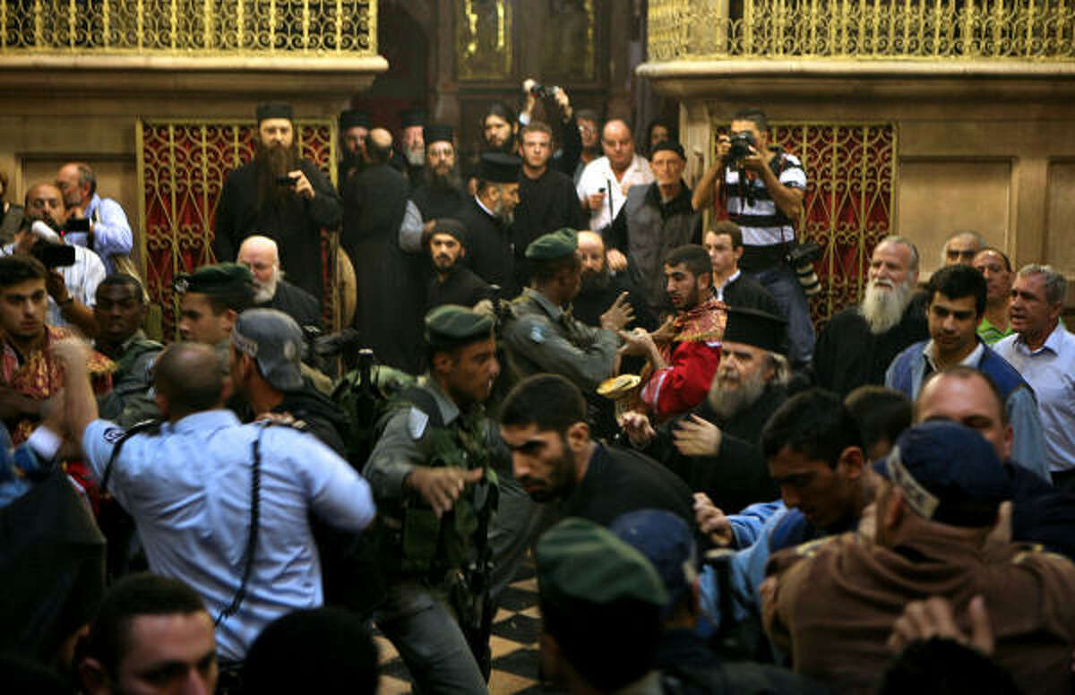 Christian monks brawl at holy site