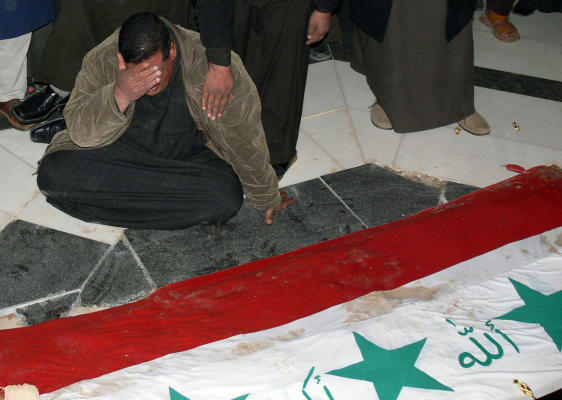 Hundreds of Iraqis view Saddam's burial