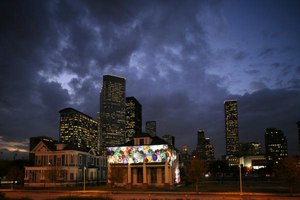 Glowing brain scans and umbrellas light up downtown