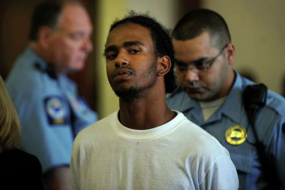 Court erupts during murder arraignment