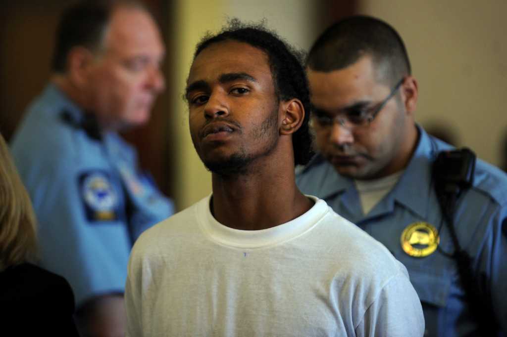 Court erupts during murder arraignment