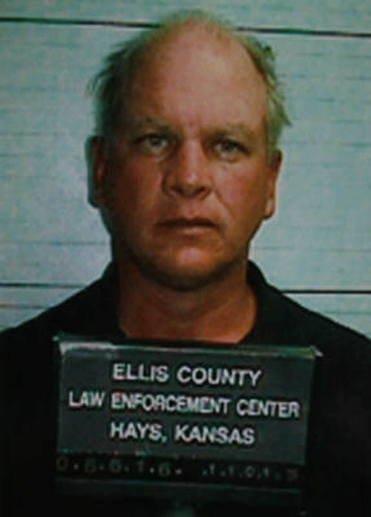 Man charged in '86 Houston stabbing deaths