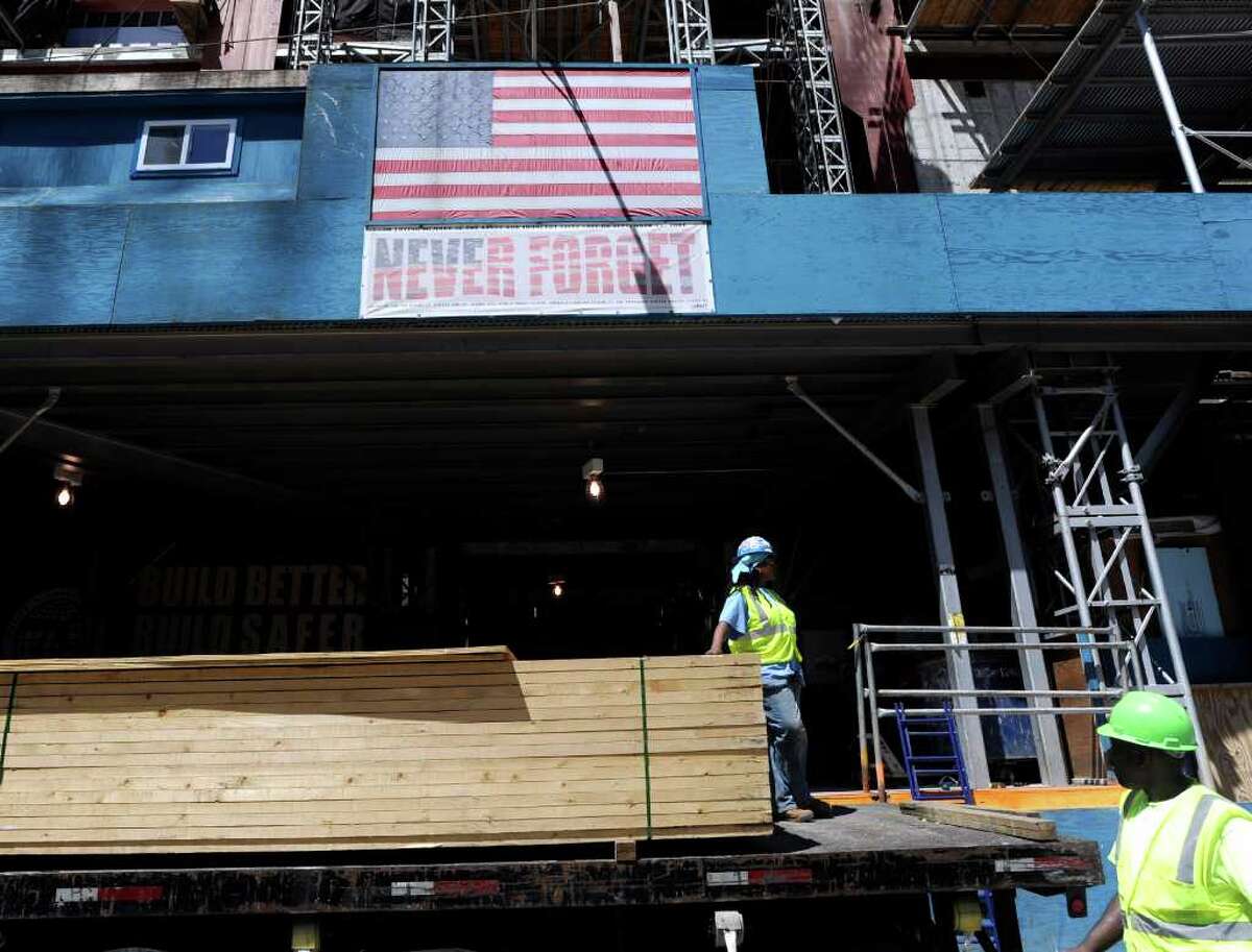 'You get back up': Freedom Tower rises from the void of ground zero