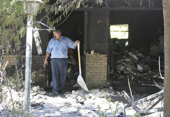 Clutter blamed in fatal Houston home fire