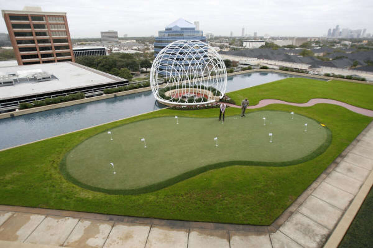 Phoenix tower owners install nine holes on roof of building