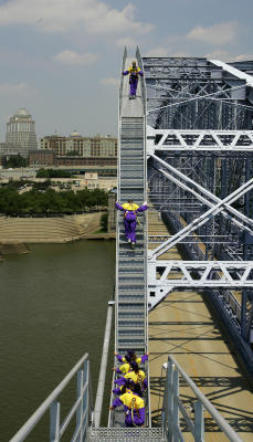Pay up, step up and climb a purple bridge