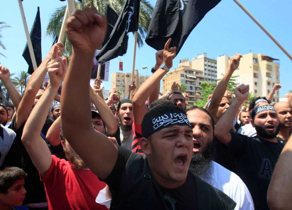 14 die in chant for Assad's death