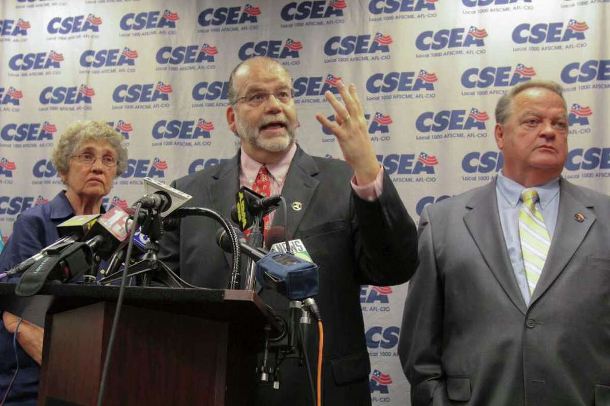 State shifts layoff threat to unions without contracts