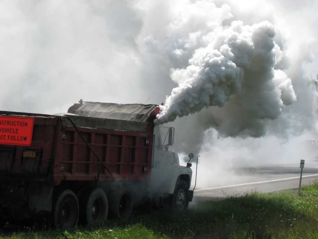 Photos: Truck sends smoke billowing over Northway