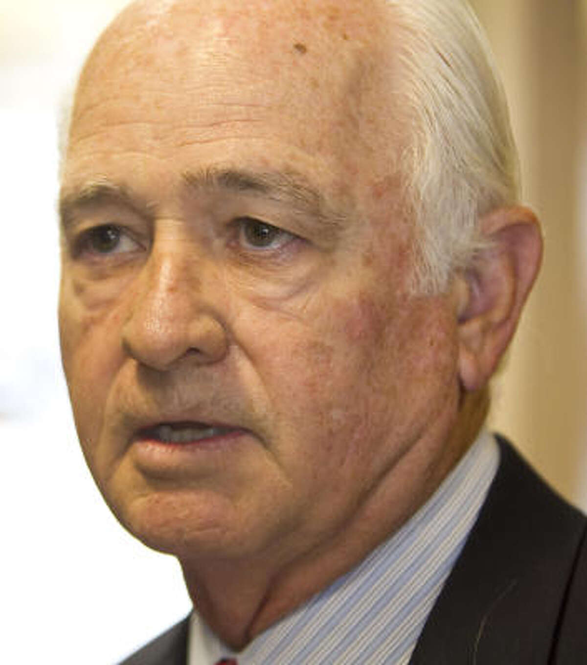 No charges for twins who lived with mom's corpse in Houston