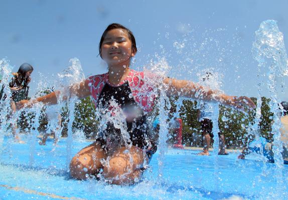 Water parks making big splash as more look to cool off