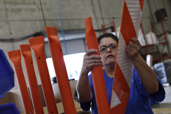 Spring-loaded flexibility helps warning-sign maker